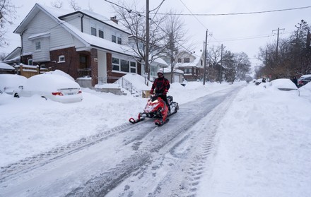 Man Drives Snowmobile Down Snowcovered Street Editorial Stock Photo ...
