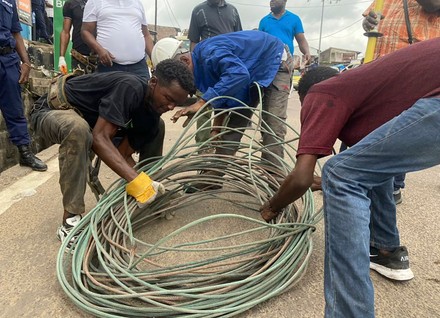 Workers Gather Power Cable After Collapse Editorial Stock Photo - Stock ...