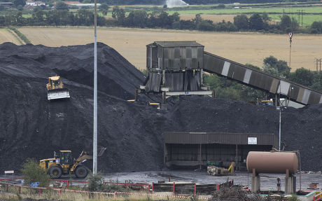 Digger Moves Amongst Coal Pile Uk Editorial Stock Photo - Stock Image ...