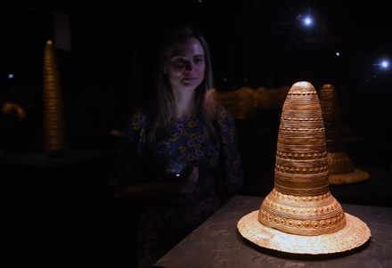 Museum Worker Poses By Case Gold Editorial Stock Photo - Stock Image ...