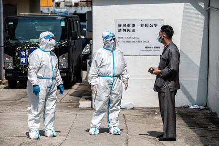 Private Mortuary Workers Full Ppe Discuss Editorial Stock Photo - Stock ...