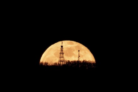 Rising Moon Seen Behind Lookout Tower Editorial Stock Photo - Stock ...