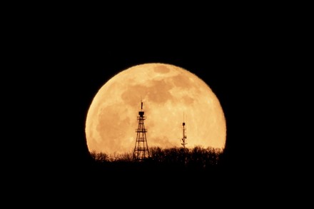 Rising Moon Seen Behind Lookout Tower Editorial Stock Photo - Stock ...