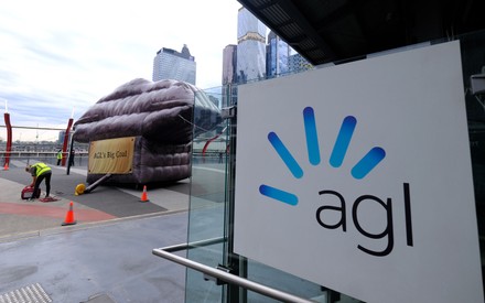 Greenpeace activists stage a protest outside AGL Energy headquarters ...