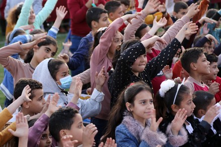 __COUNT__ Palestinian orphans attend a ceremony and a breakfast meal ...