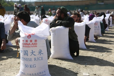 People Receive Food Donated By China Editorial Stock Photo - Stock ...