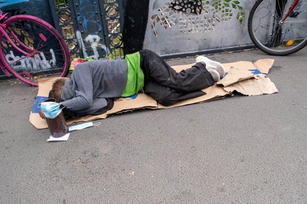 Homeless Man Sleeping On Cardboard Boxes Editorial Stock Photo - Stock ...