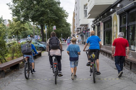 Young Cyclists Ride On Sidewalk On Editorial Stock Photo - Stock Image ...