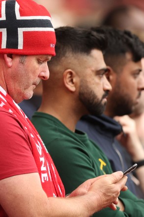 Liverpool Fans Check Their Phones Editorial Stock Photo - Stock Image ...
