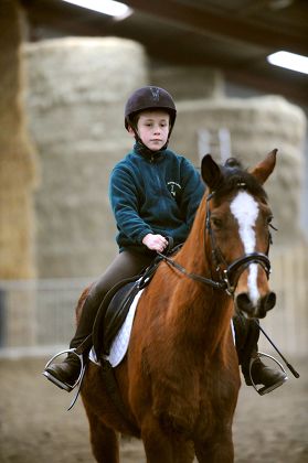 Young Boy Horse Riding Editorial Stock Photo - Stock Image | Shutterstock