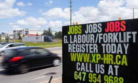 Vehicle Runs Past Job Board By Editorial Stock Photo - Stock Image ...