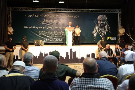 Palestinians participate in a memorial ceremony for Jamal Abu Samhadana ...