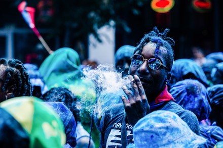 Parade Reveler Seen Smoking Behind Main Editorial Stock Photo - Stock ...