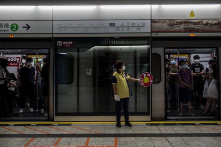 Mtr Worker Holding Sign On Platform Editorial Stock Photo - Stock Image ...