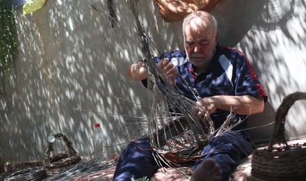 Palestinian man Zakaria Aboud, 70, makes baskets using wheat and olive ...