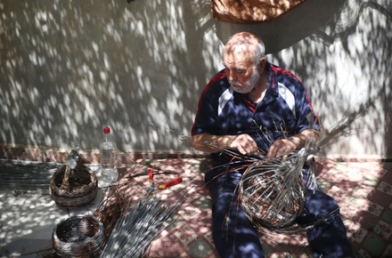 Palestinian man Zakaria Aboud, 70, makes baskets using wheat and olive ...
