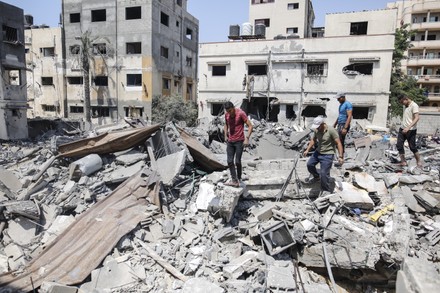Palestinians Inspect Buildings Damaged After Israeli Editorial Stock ...