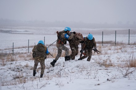 Soldiers Peacekeeping Forces Help Colleague Move Editorial Stock Photo ...