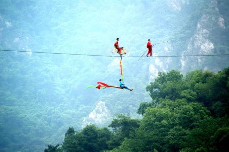 Chinese wire artists set new world record for walking the longest ...