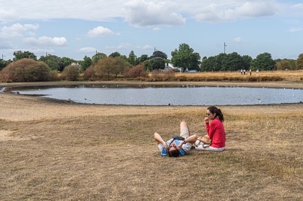 People Relaxing Enjoying Warm Weather On Editorial Stock Photo - Stock ...