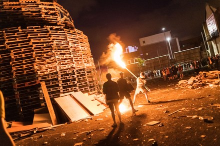 Man Lights Bonfire Set On Sandy Editorial Stock Photo - Stock Image ...