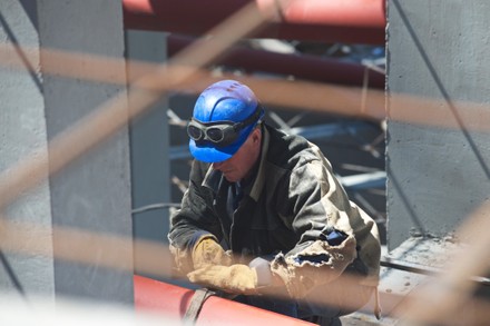 Worker Checks Fasteners On Pipe On Editorial Stock Photo - Stock Image ...