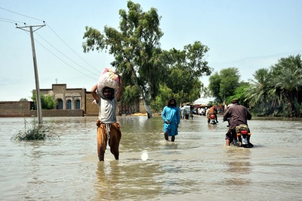 People Wade Through Flooded Area Following Editorial Stock Photo ...