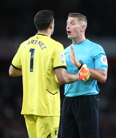 Referee Robert Jones Instructs Emiliano Martinez Editorial Stock Photo ...
