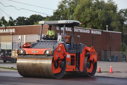 Worker Drives Large Steamroller On Route Editorial Stock Photo - Stock ...