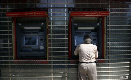 Iranian Man Uses Atm On Street Editorial Stock Photo - Stock Image ...