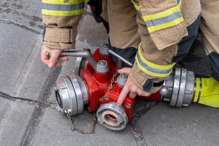 Firefighter Checks Valves Water Manifold During Editorial Stock Photo ...