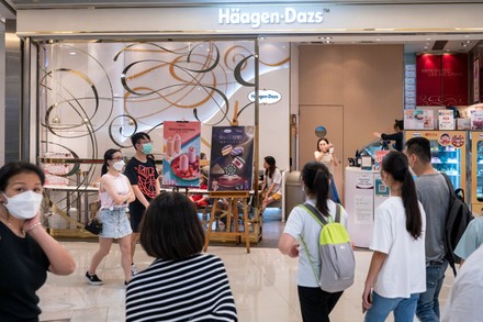 Shoppers Walk Past American Ice Cream Editorial Stock Photo - Stock ...