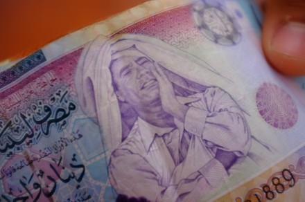Gaddafi on Libyan banknotes - Tripoli, Libya - 09 Sep 2011 Stock ...