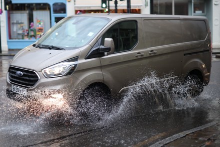 Van Drives Through Large Puddle During Editorial Stock Photo - Stock ...