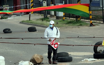 Man Stands Roadblock Set On Street Editorial Stock Photo - Stock Image ...