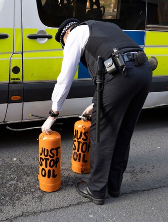 Police Officer Removes Two Fire Extinguisher Editorial Stock Photo ...