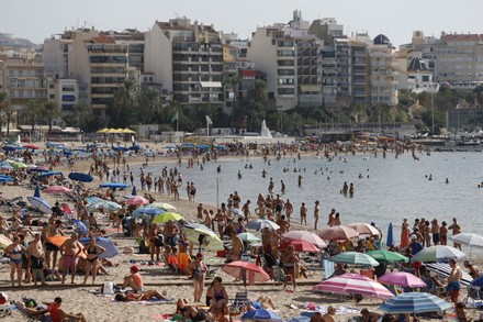 Beachgoers Enjoy Day On Seaside During Editorial Stock Photo - Stock ...