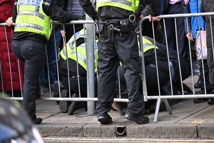 Protester Patrick Thelwell Detained After Throwing Editorial Stock ...