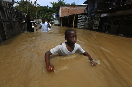 Children Walk Through Neighborhoods Flooded By Editorial Stock Photo ...