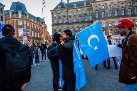 Uyghur Man Seen Hugging His Son Editorial Stock Photo - Stock Image ...