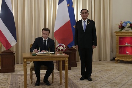 French President Emmanuel Macron L Signs Editorial Stock Photo - Stock ...
