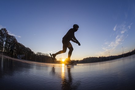 Skating Enthusiasts On Natural Ice Rink Editorial Stock Photo - Stock ...
