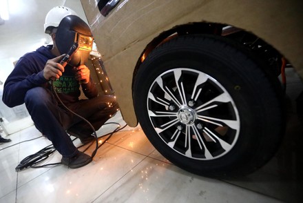 Mechanic Works On Hybrid Vehicle Designed Editorial Stock Photo - Stock ...