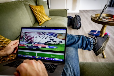 Man Gambling Online On Laptop Editorial Stock Photo - Stock Image ...