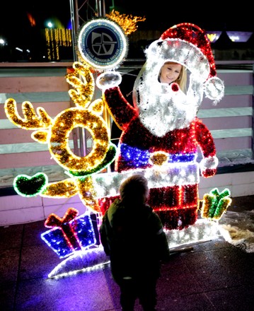Woman Behind Santa Claus Decoration Looks Editorial Stock Photo - Stock ...