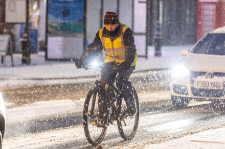 Cyclist Rides Through Snow This Morning Editorial Stock Photo - Stock ...