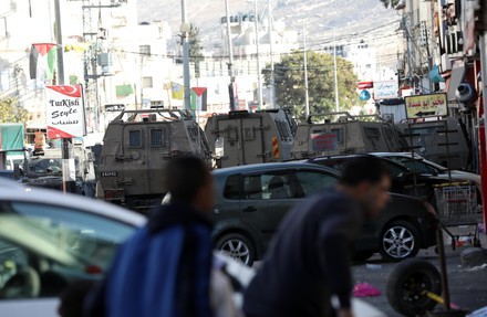Palestinians Throw Stones Towards Israeli Military Editorial Stock ...