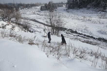 People Walk Snow Covered Hilly Area Editorial Stock Photo - Stock Image ...