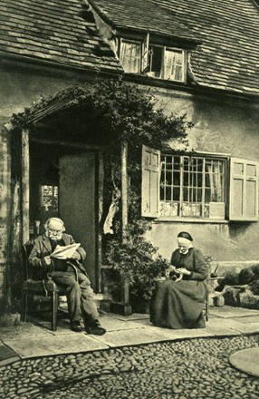 Elderly Couple Relaxing Outside Their Cottage Editorial Stock Photo ...