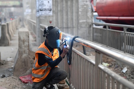 Laborer Works On Railing Without Proper Editorial Stock Photo - Stock ...